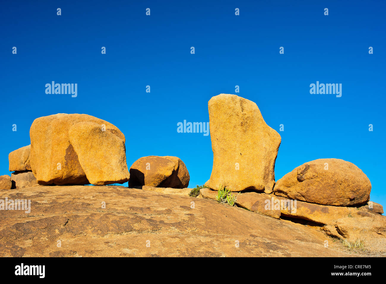 Large granite boulders on a rock ledge, Anti-Atlas Mountains, southern ...