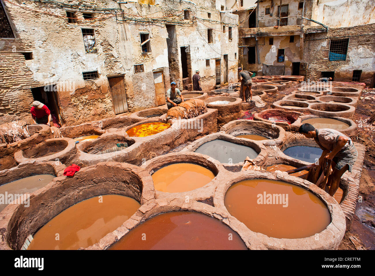 Dyeing pits in the traditional tannery in the historic town centre or ...