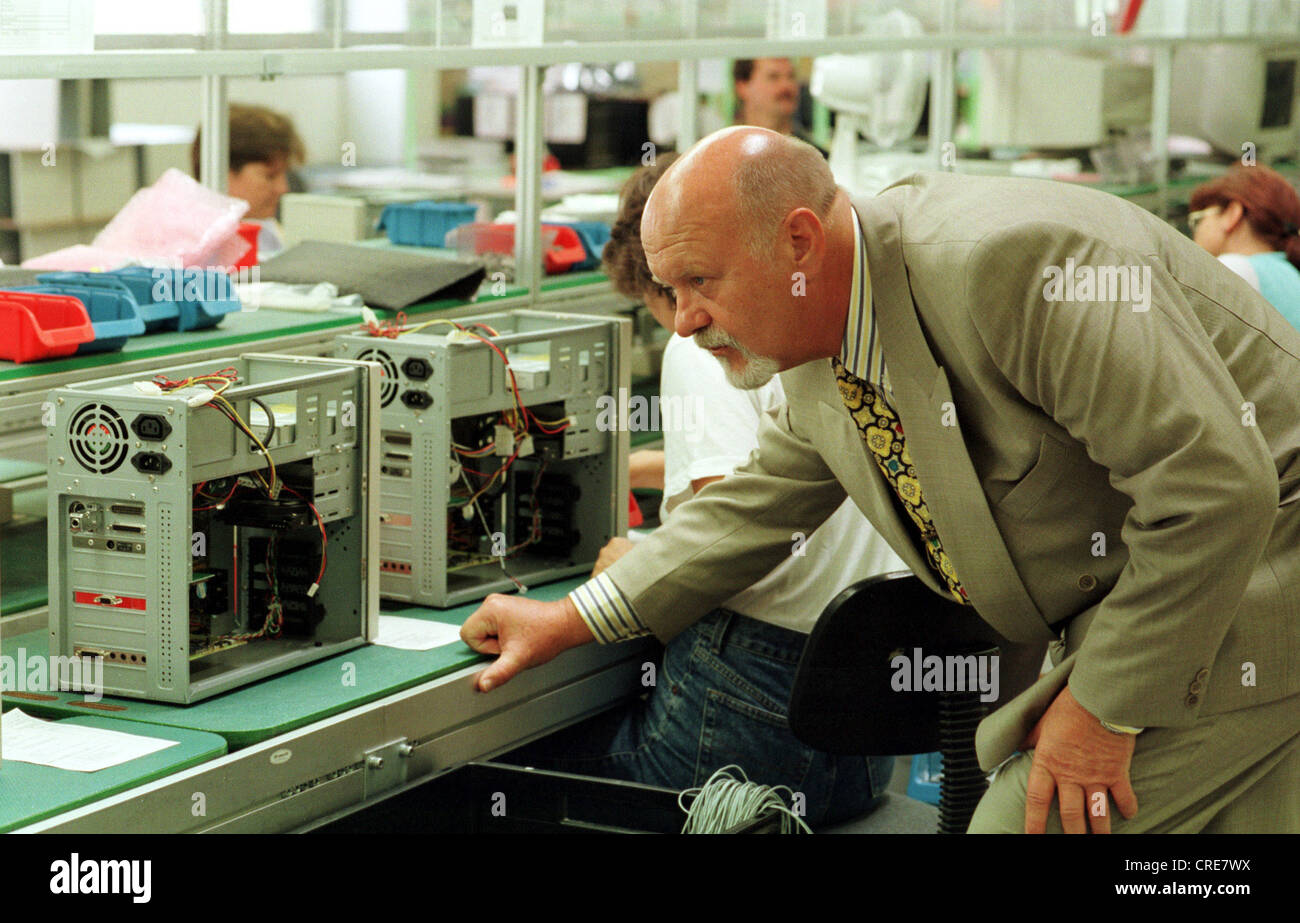 Winfried Hoffmann, chairman of the board was Fujitsu ICL Computers GmbH ...