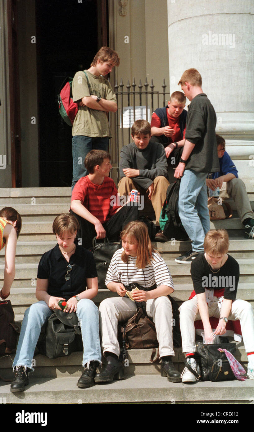 Young people on the steps of the German Cathedral, Berlin, Germany ...