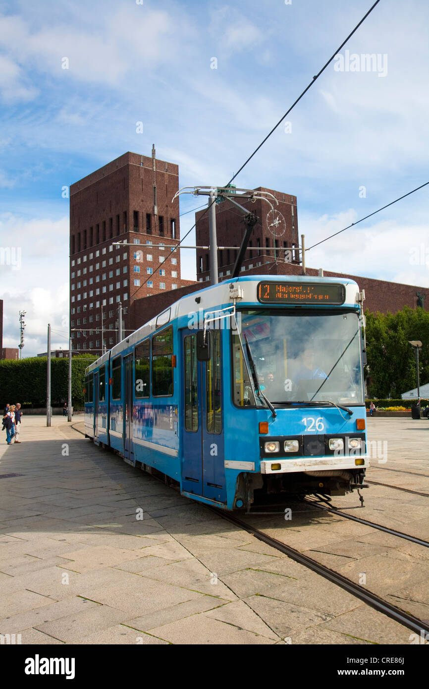 Picture shows a Tram in front of the Radhus Oslo Town Hall, Oslo Harbor ...