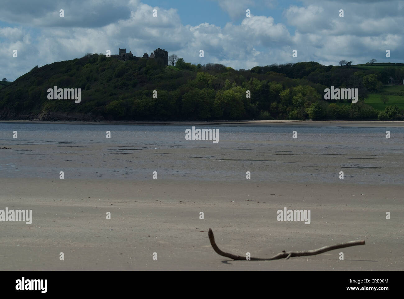 drift wood on the shore of the beach at Ferryside South Wales U/K Stock ...