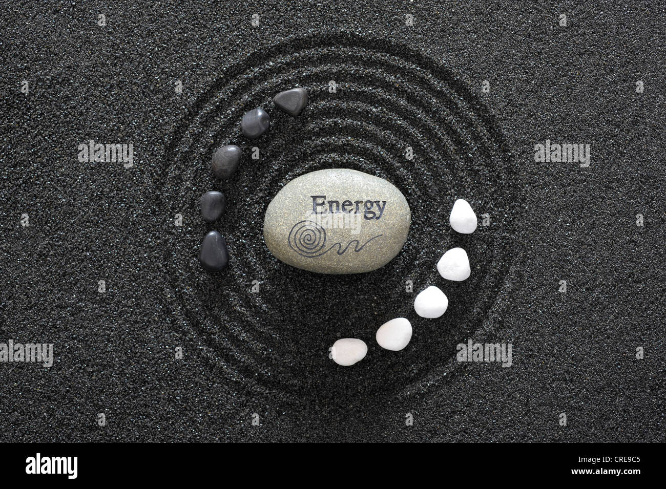 stone of energy in zen garden Stock Photo - Alamy