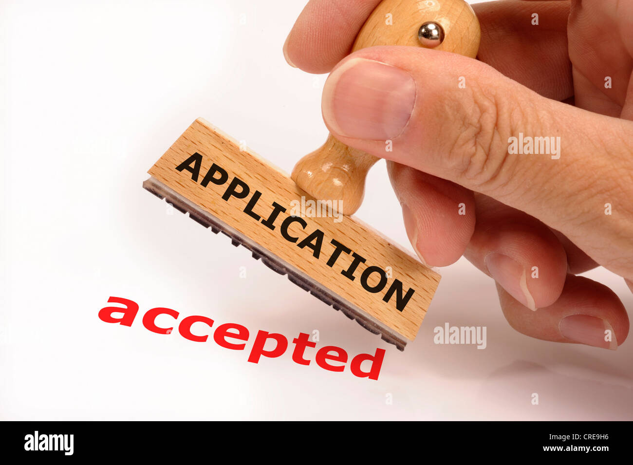 rubber stamp marked with application accepted Stock Photo - Alamy