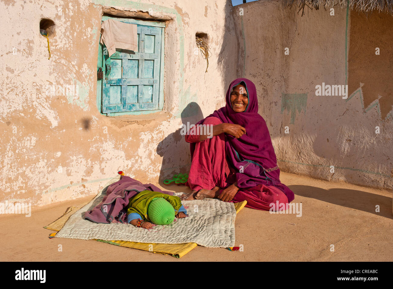 Indian woman wearing red sari hi-res stock photography and images - Alamy