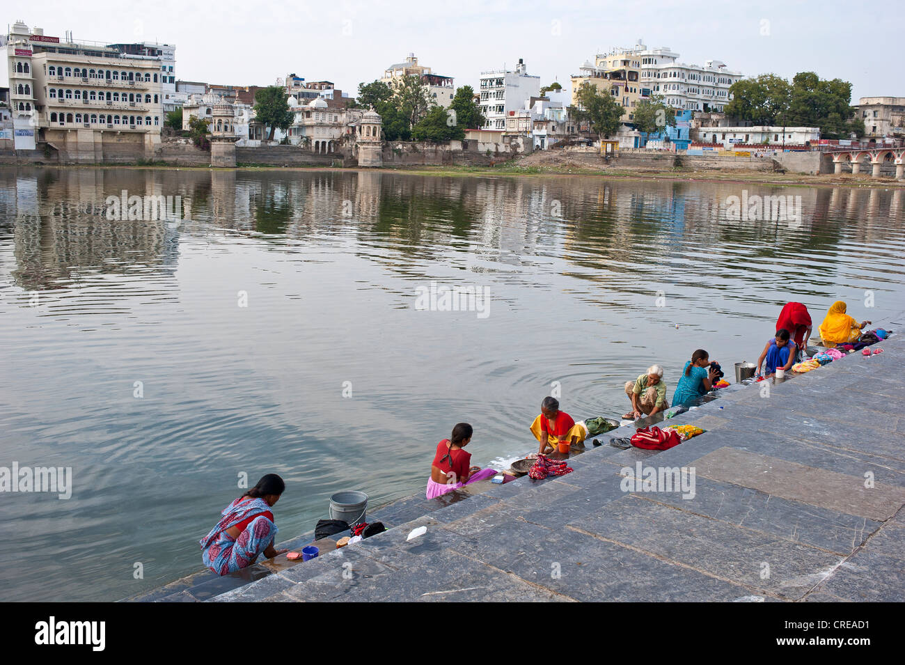 Indian women washing clothes hi-res stock photography and images - Alamy