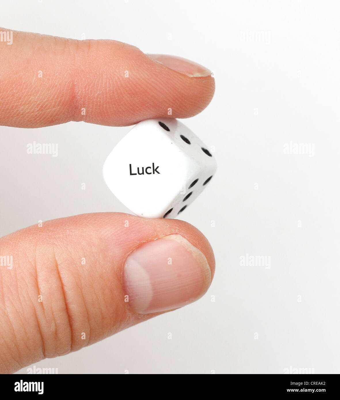 A dice in a studio Stock Photo - Alamy