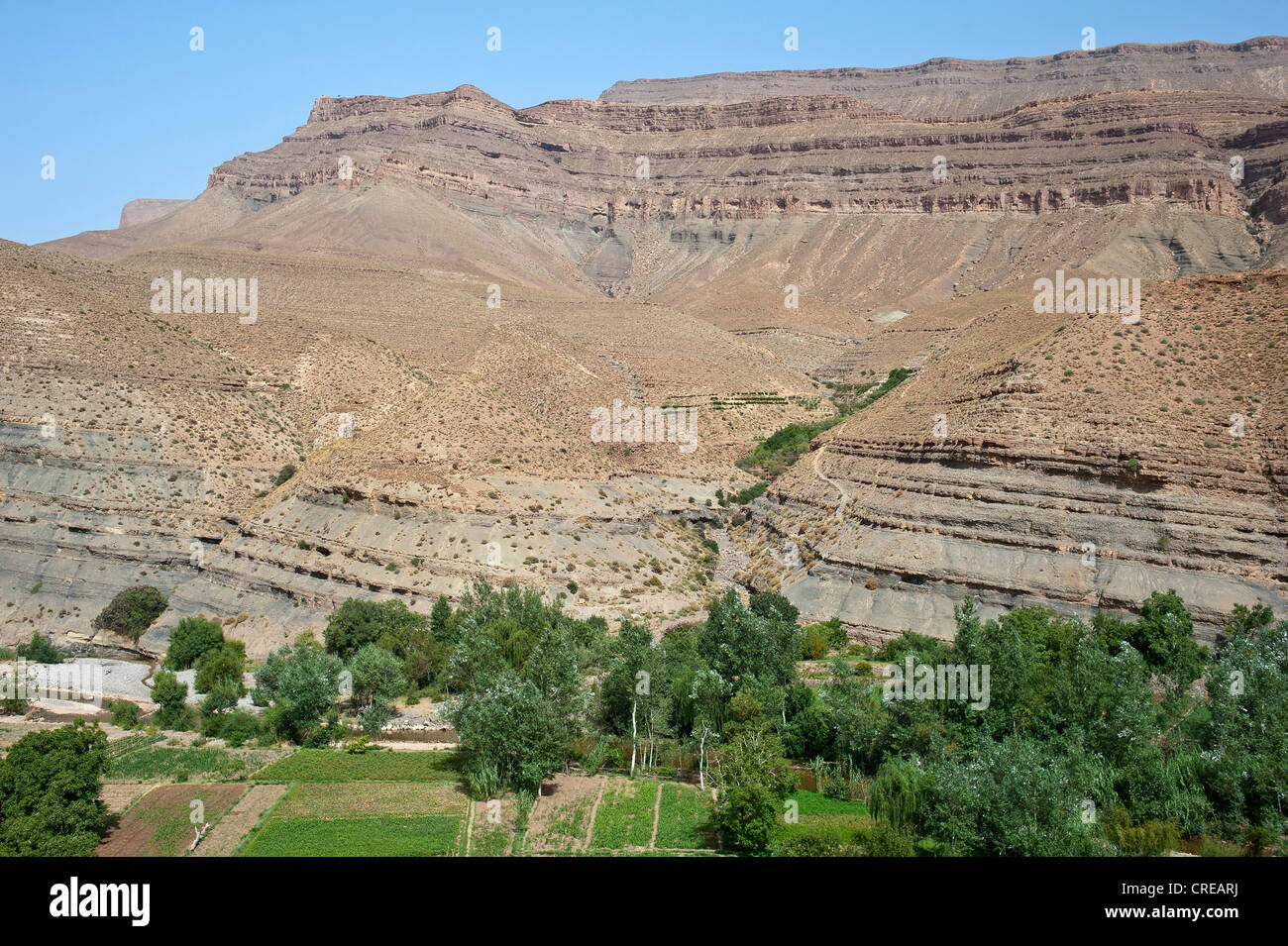 Mountains, escarpment landscape with small fields in the river valley ...