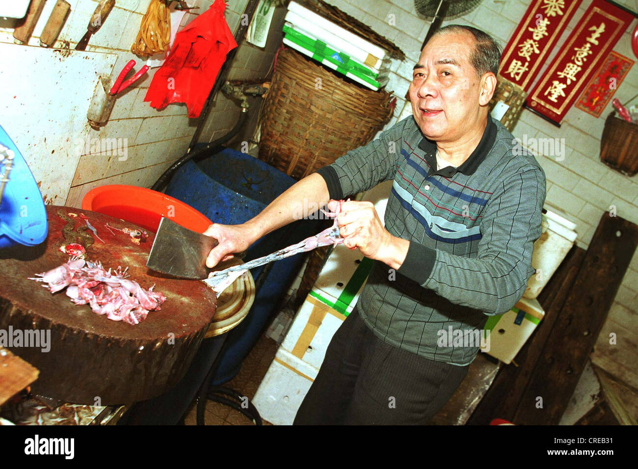 Chinese skinning of frogs in Hong Kong Stock Photo - Alamy