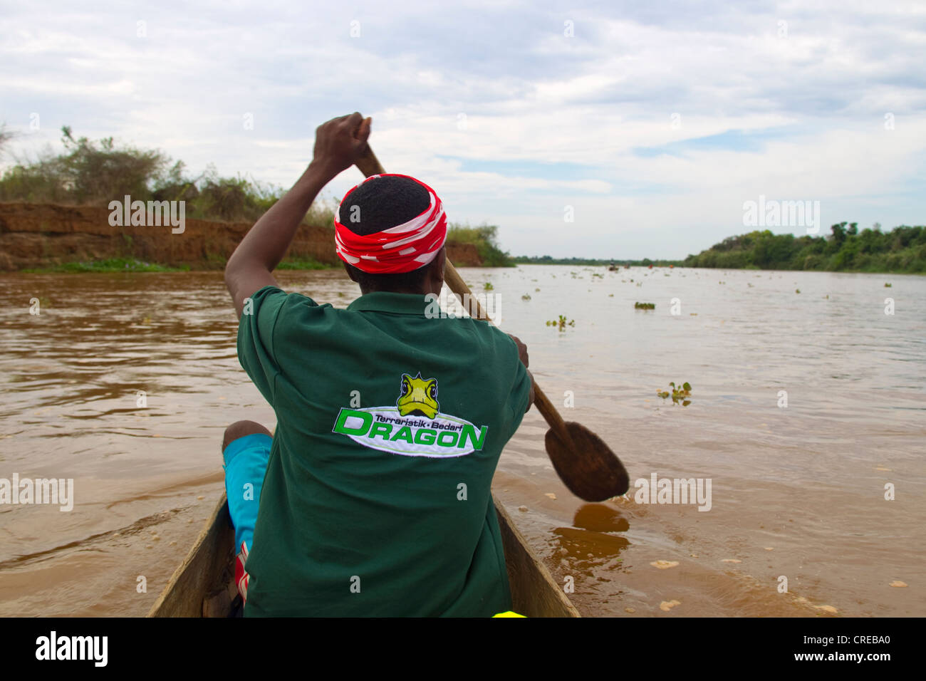 Malagasy, tour leader in a dugout boat, Madagascar, Africa Stock Photo ...