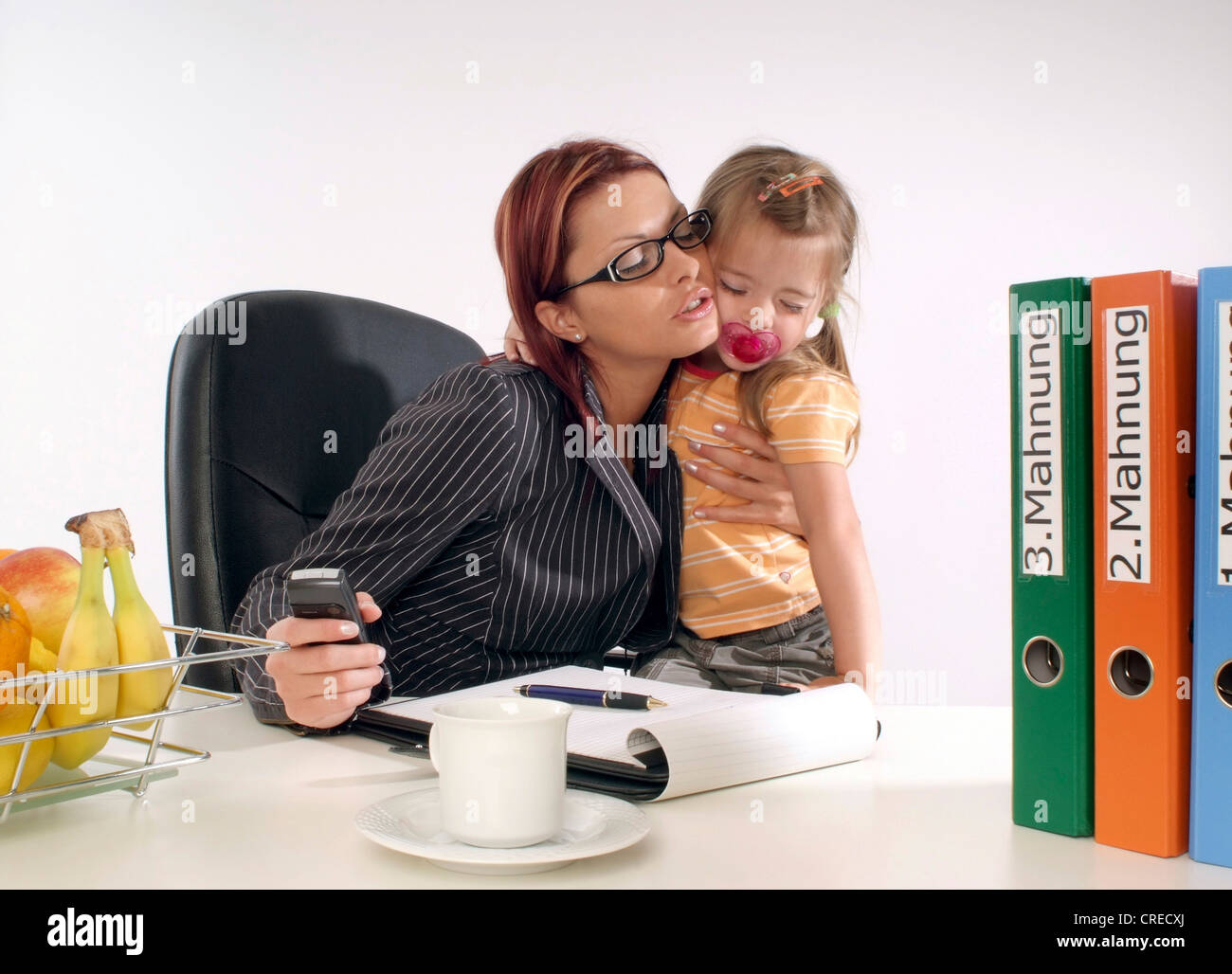 Parents sitting in desks hi-res stock photography and images - Alamy
