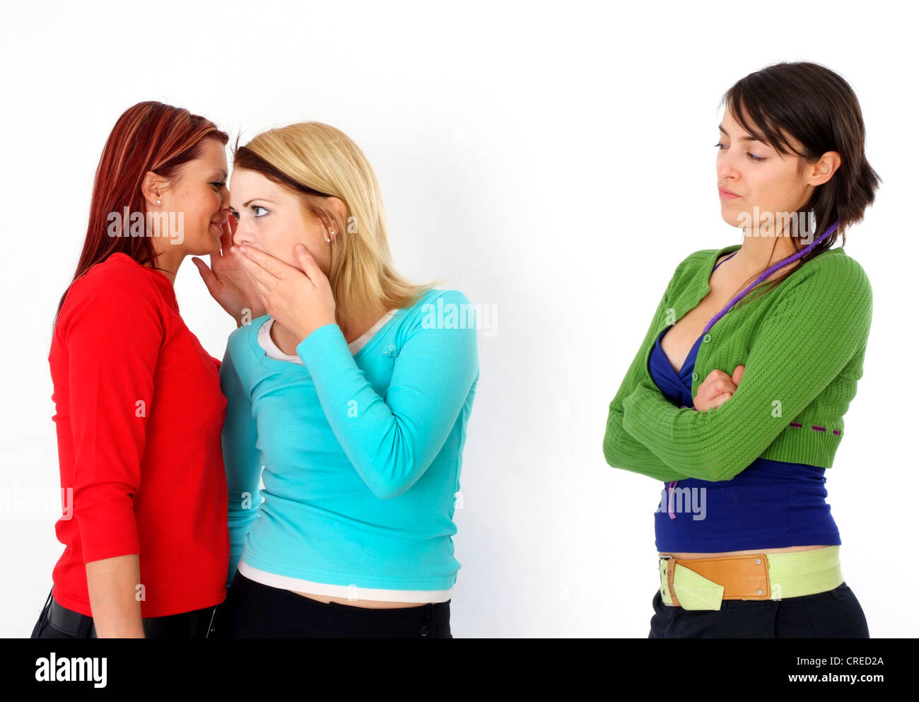 Two women whisper together hi-res stock photography and images - Alamy