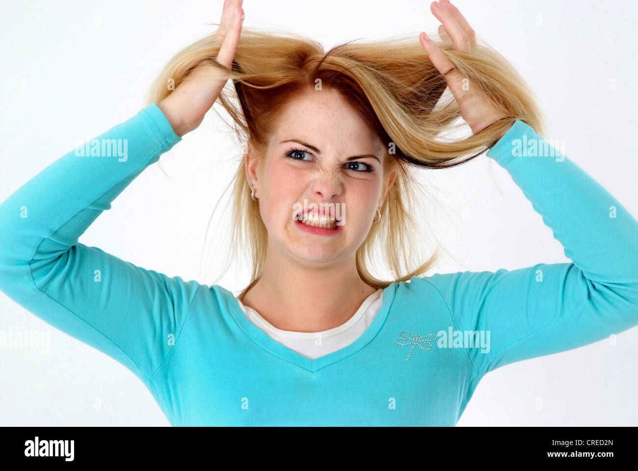 Studio portrait disgruntled angry young hi-res stock photography and ...