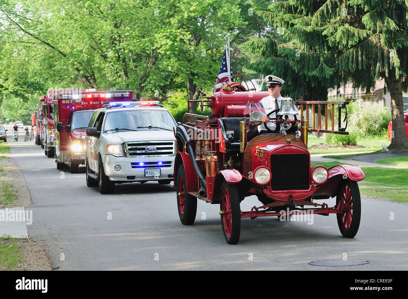 A vintage 1923 fire engine from small town America riding in the ...