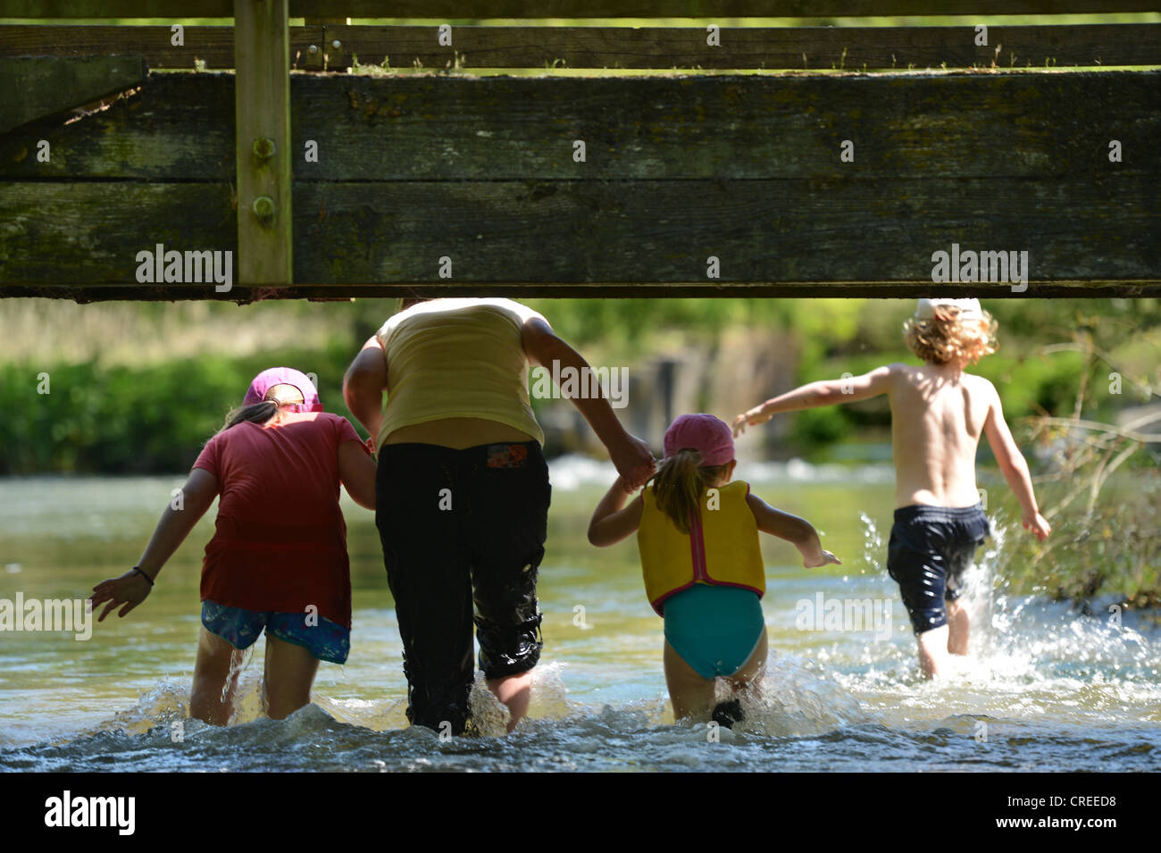 Kids Swimming In A Stream High Resolution Stock Photography and Images ...