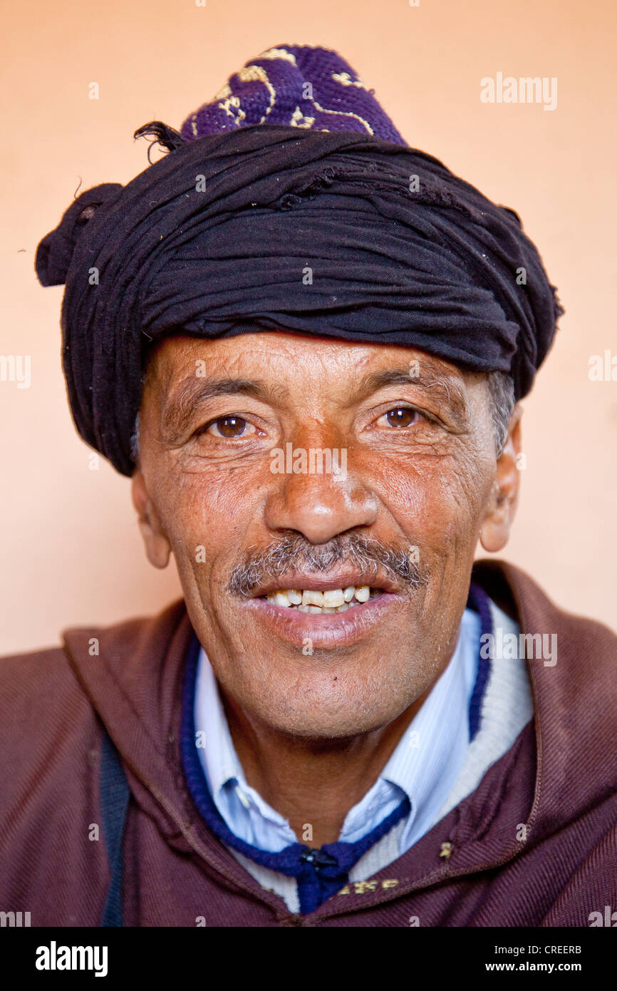 Berber wearing a Djellaba, a traditional robe, near Asni, Morocco ...