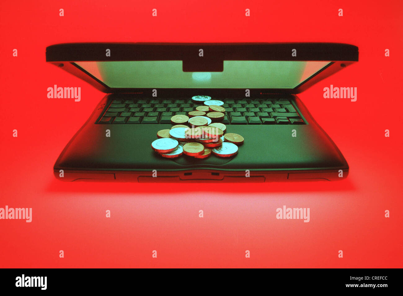 Computer and money Stock Photo - Alamy