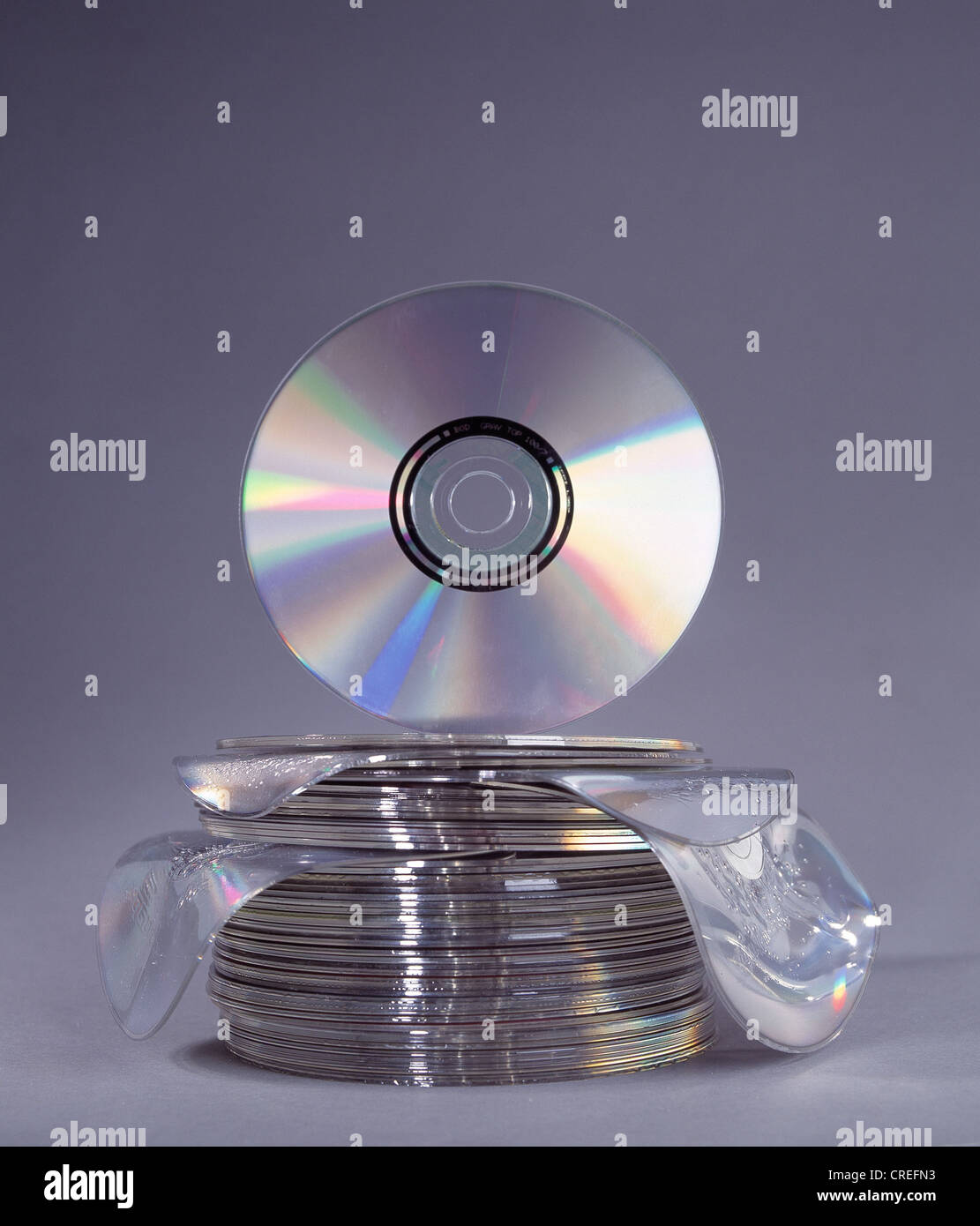 Stacks of CDs, partially broken Stock Photo - Alamy