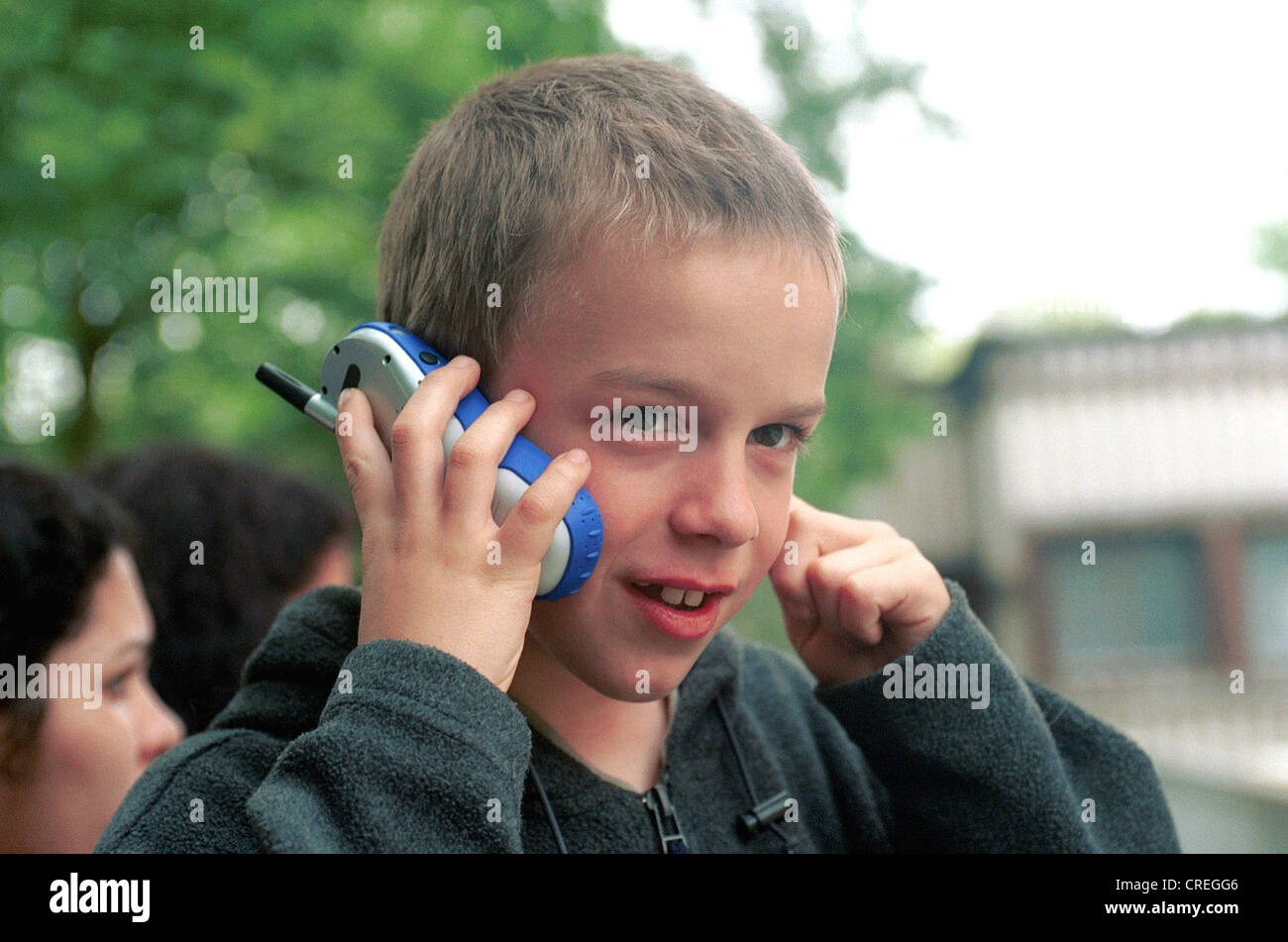 Child with mobile phone, Duisburg, Germany Stock Photo - Alamy