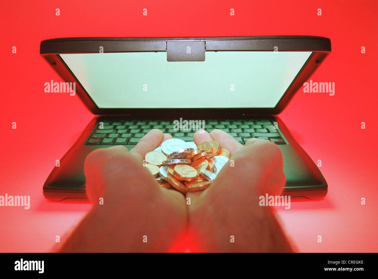 Computer and money Stock Photo - Alamy