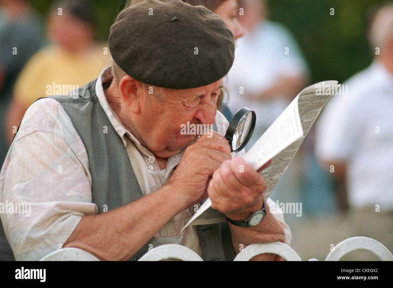 Old man reading a newspaper, Hoppegarten, Germany Stock Photo - Alamy
