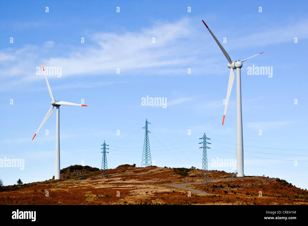 Wind turbines and electricity pylons on the Paul da Serra plateau ...