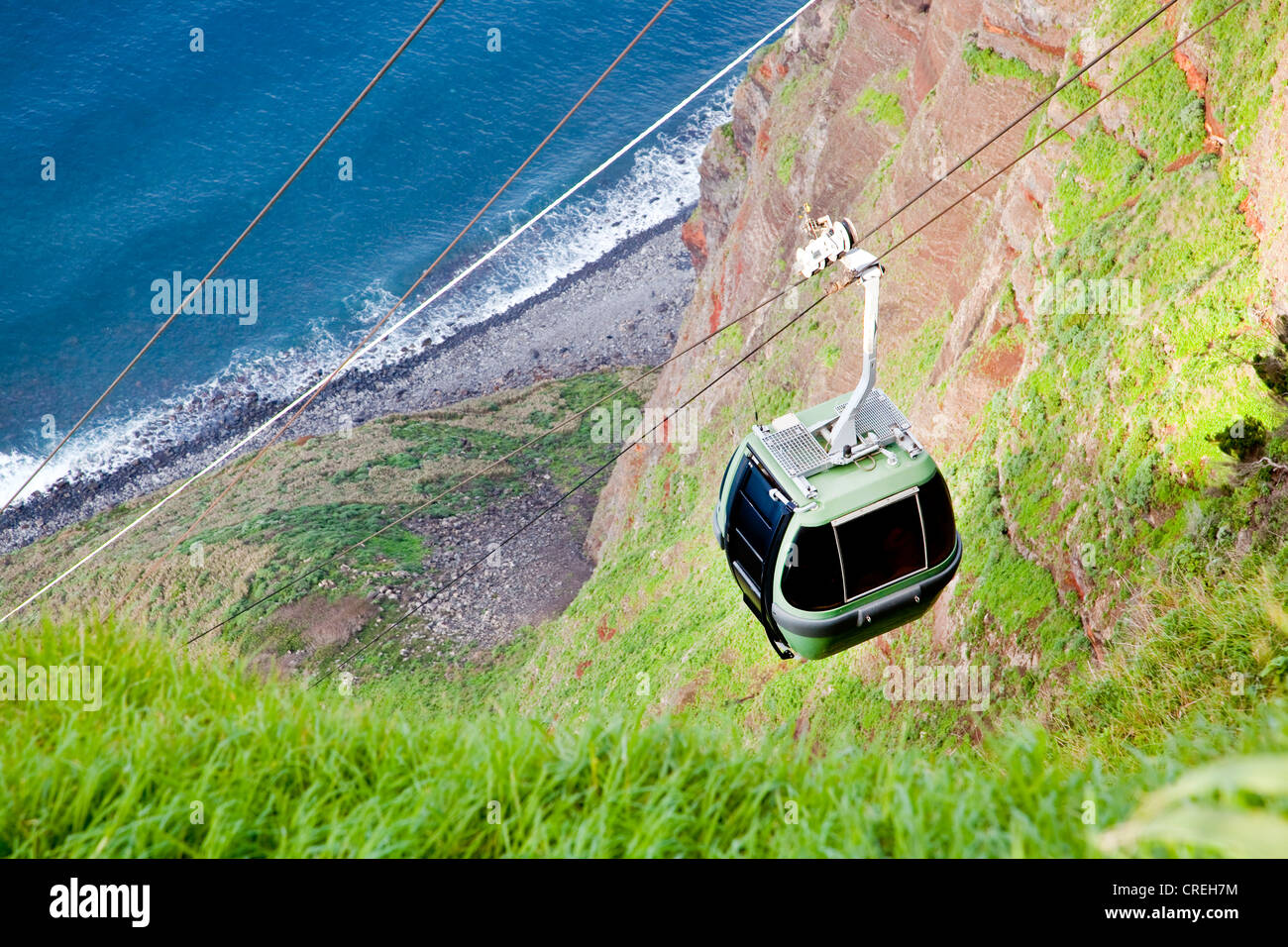 Cable car to the fields and plantations on the rock cliffs of the ...