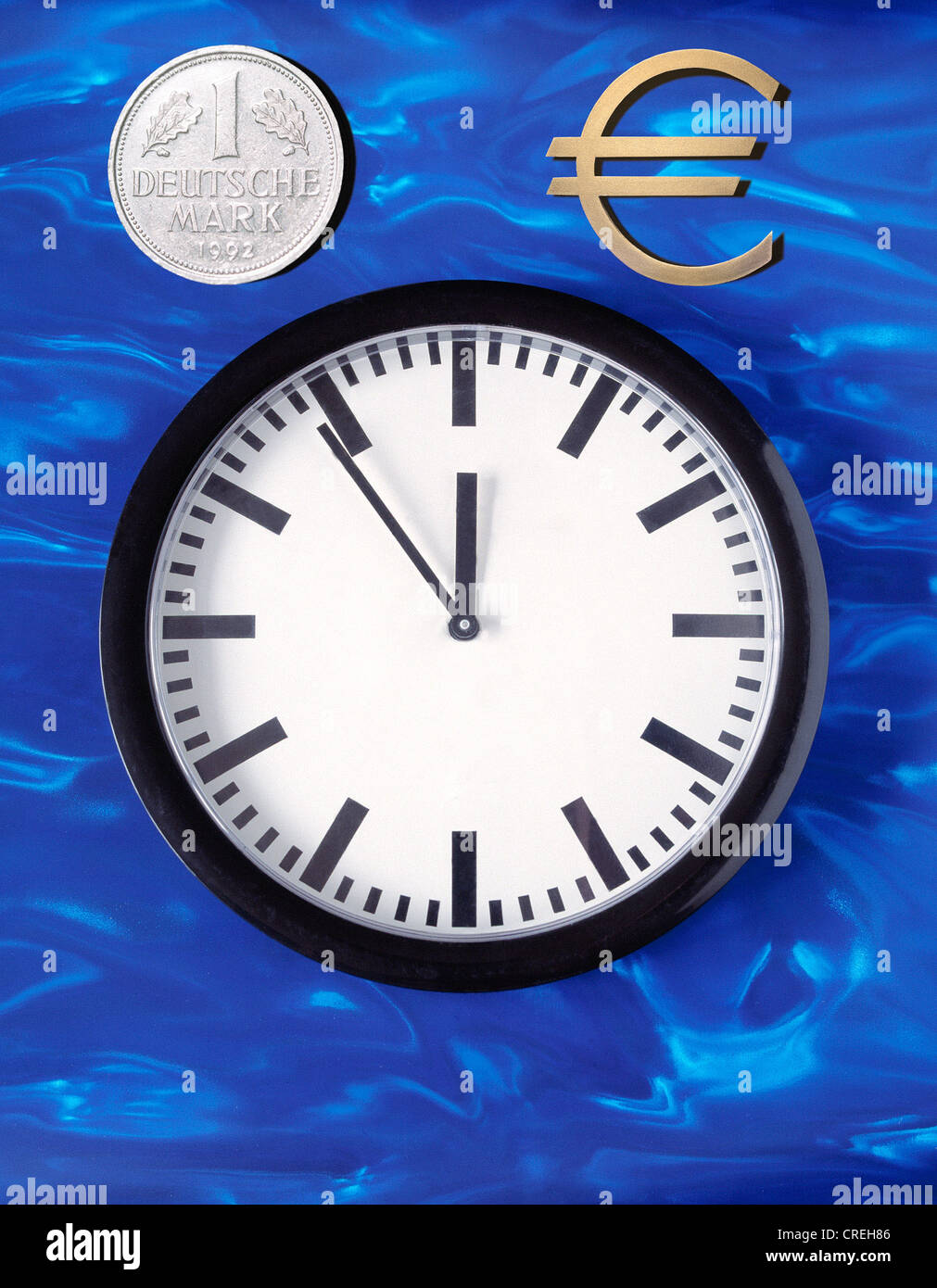 Clock showing 11:55, with DM and Euro symbol Stock Photo - Alamy