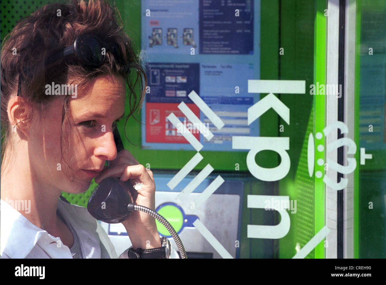 Woman in phone booth KPN, Texel, Texel, Netherlands Stock Photo - Alamy