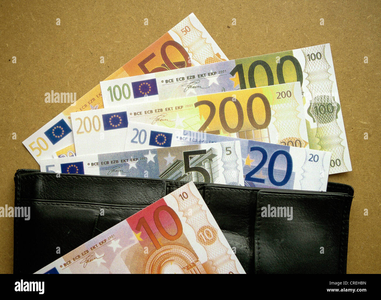 Euro banknotes in different denominations with purse Stock Photo - Alamy