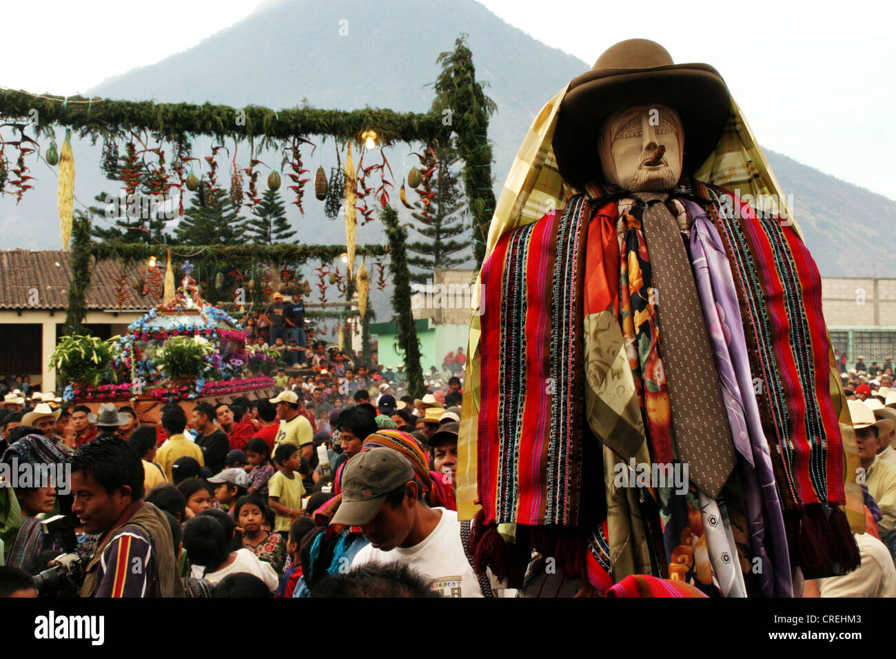 Maya patron saint Maximon in procession through Santiago de Atitlan ...