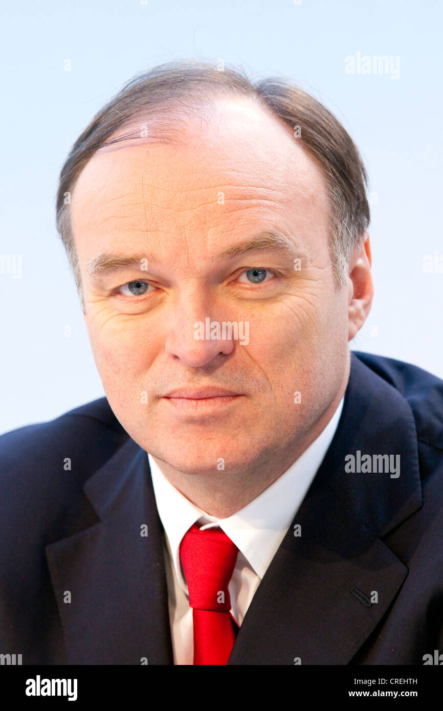 Thomas Ebeling, CEO of the ProSiebenSat.1. Media AG with its logo ...