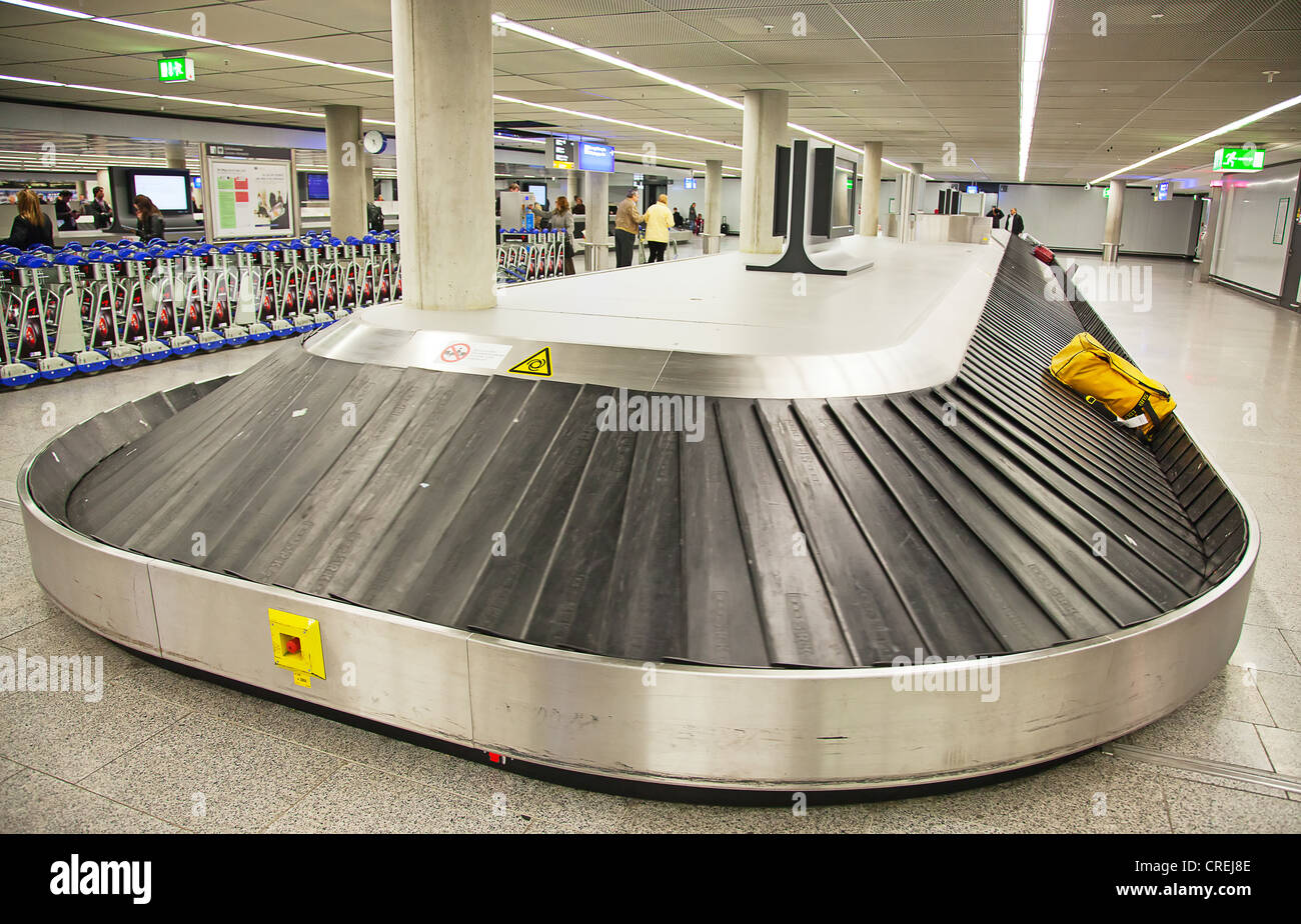 Empty baggage belt in the modern airport Stock Photo - Alamy