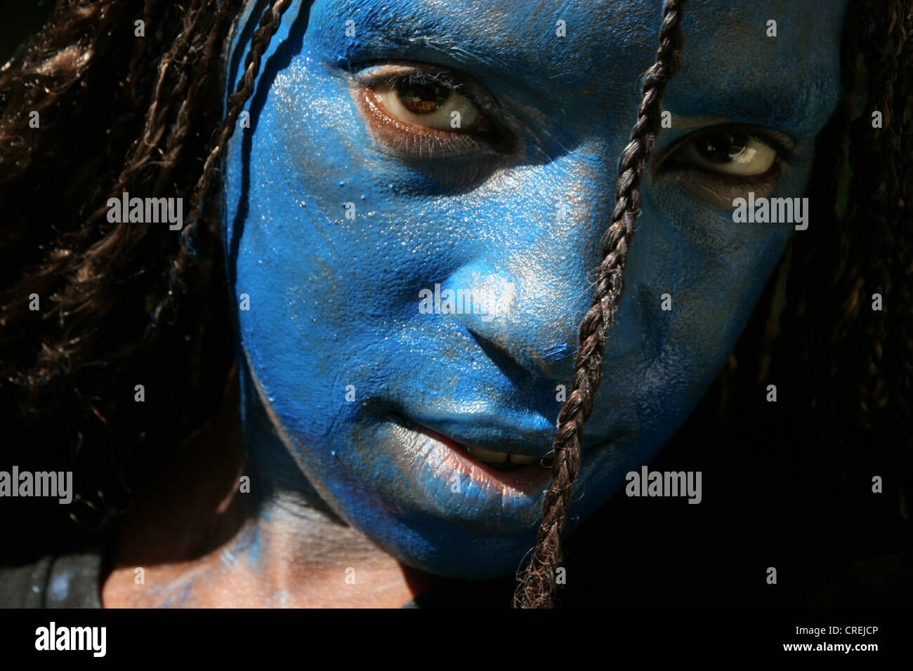 portrait of a cuban beauty with blue face paint, Cuba, La Habana Stock ...