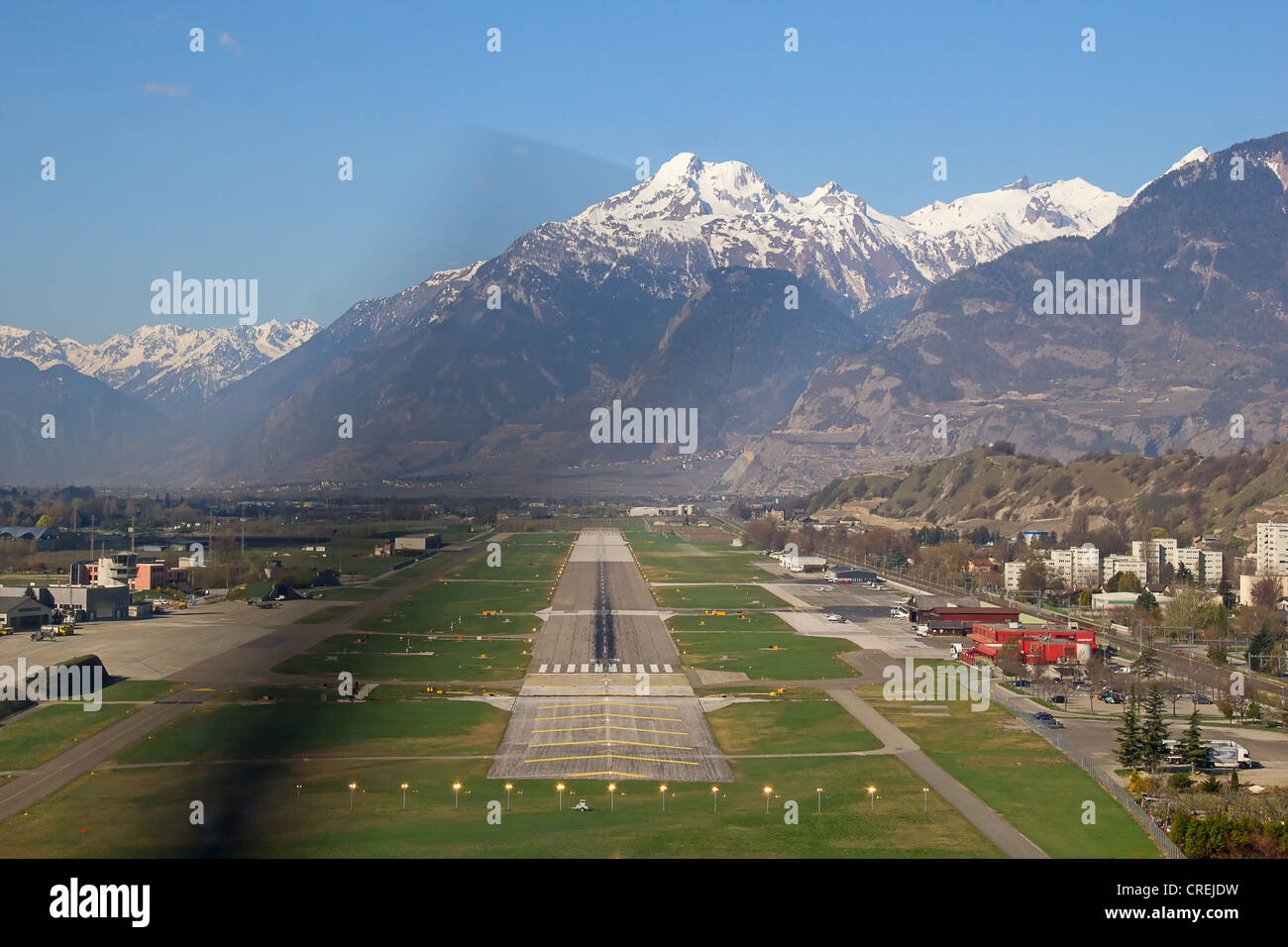 Military airport runway on landing approach. Taken from cockpit of ...