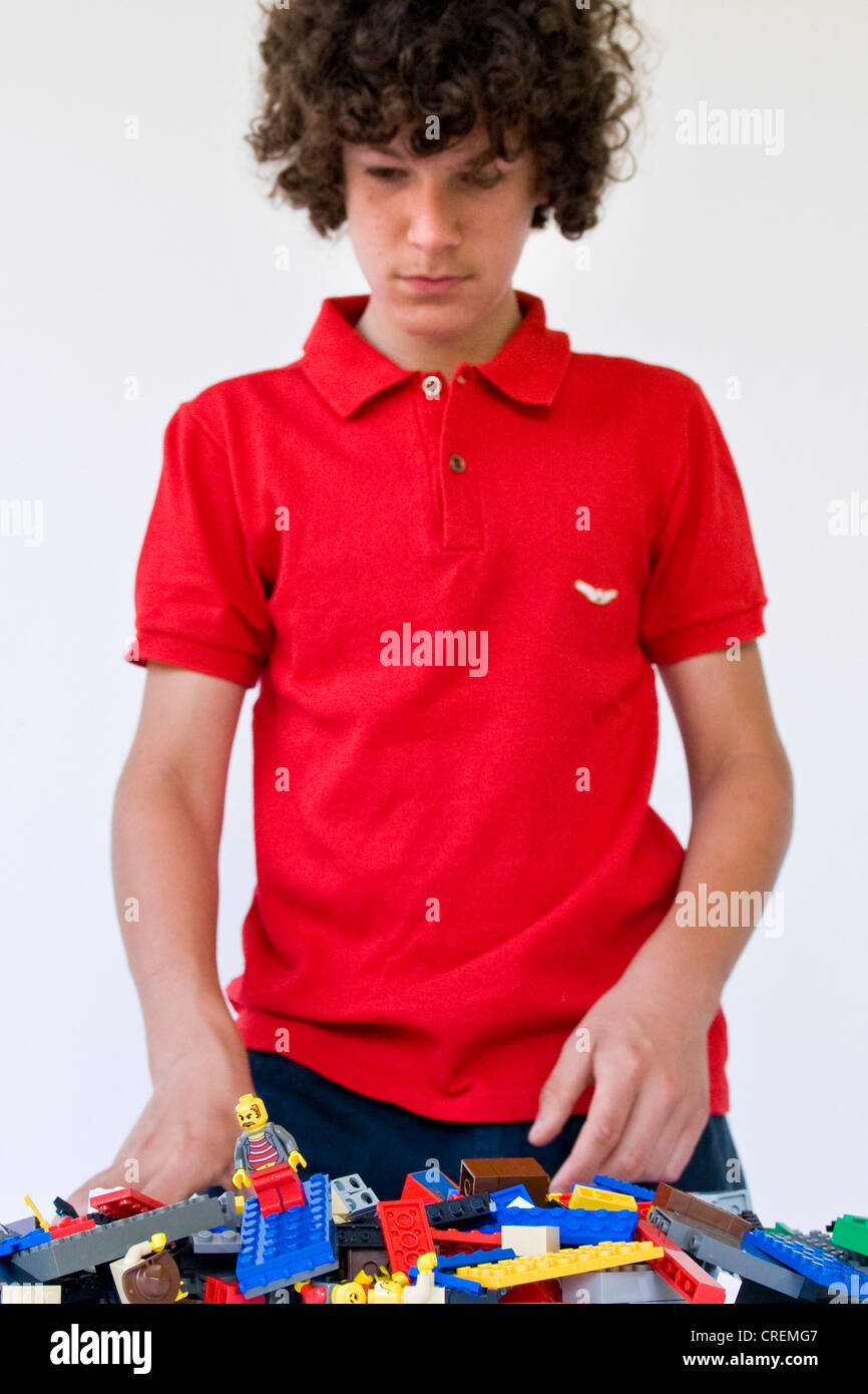 Boy playing with Lego Stock Photo - Alamy