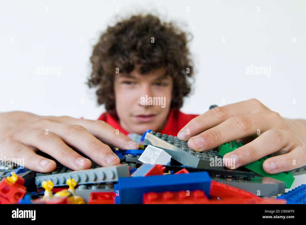 Boy playing with Lego Stock Photo - Alamy