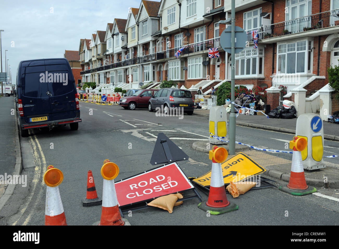 Belongings left outside flood damaged properties in South Terrace ...
