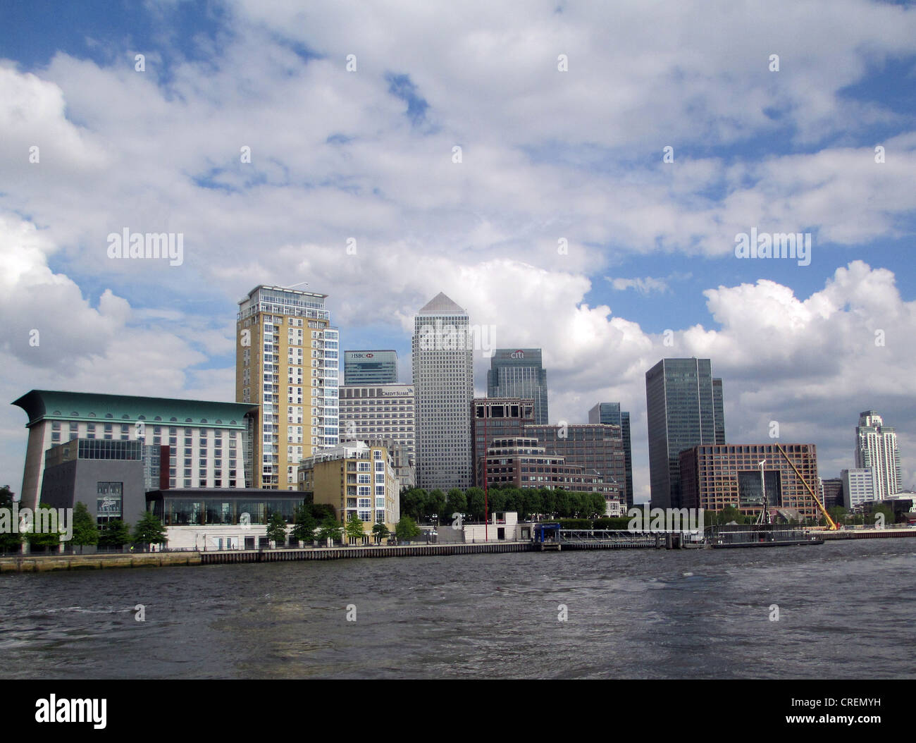 CANARY WHARF business district in Poplar, London viewed from the Thames ...