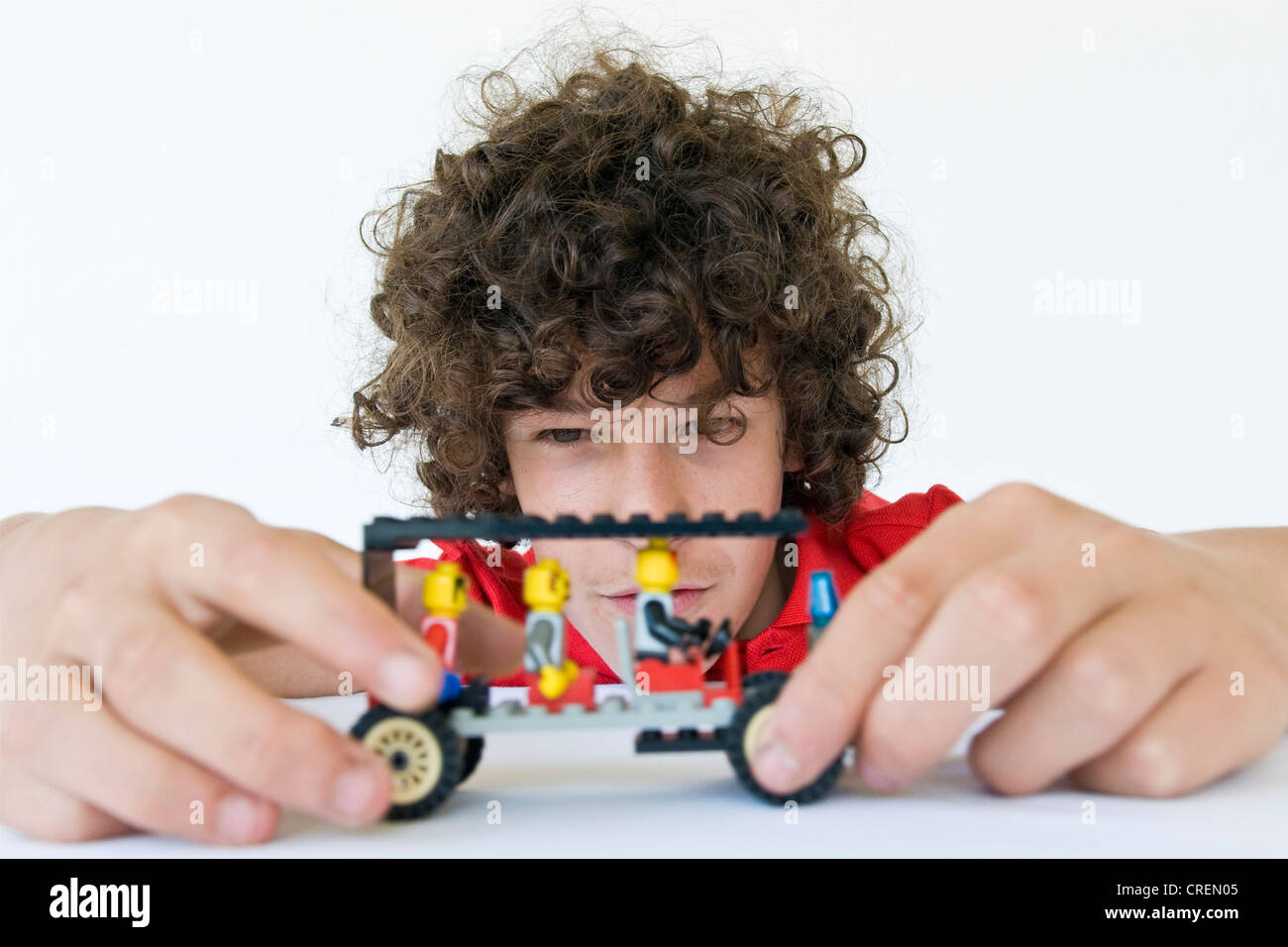 Boy playing with Lego Stock Photo - Alamy