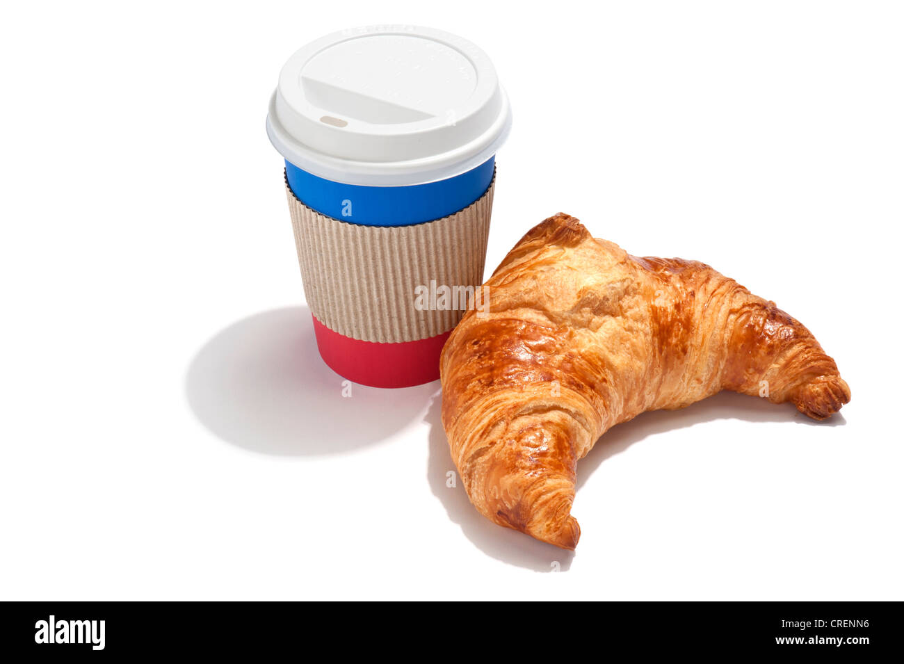 A croissant and a takeaway drink cup Stock Photo - Alamy