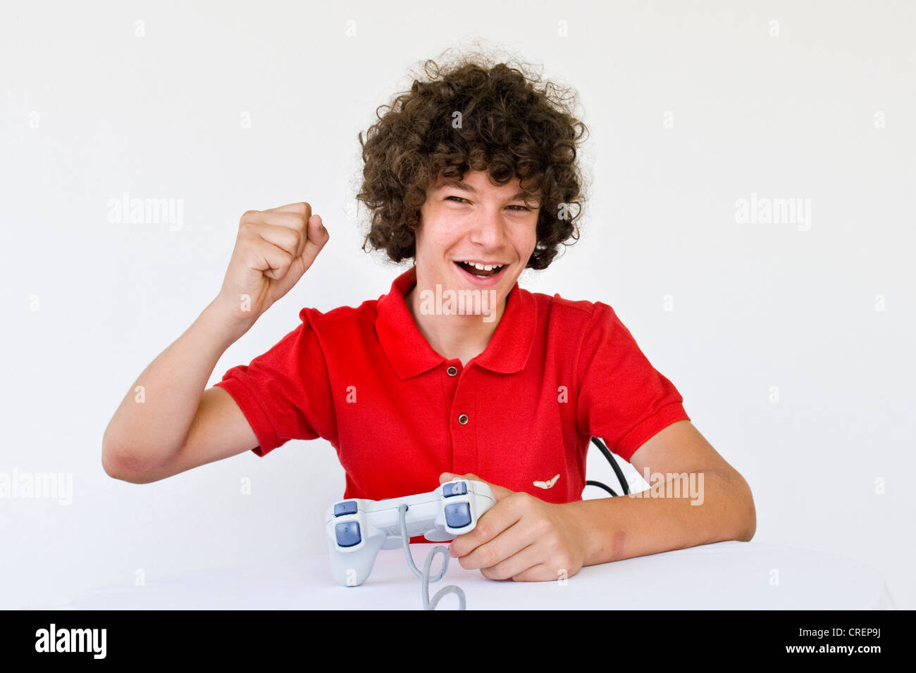 Boy playing video game Stock Photo - Alamy