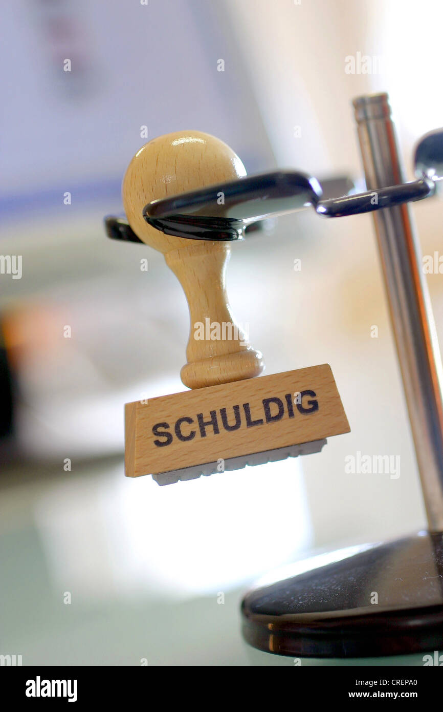 stamp schuldig, guilty Stock Photo - Alamy