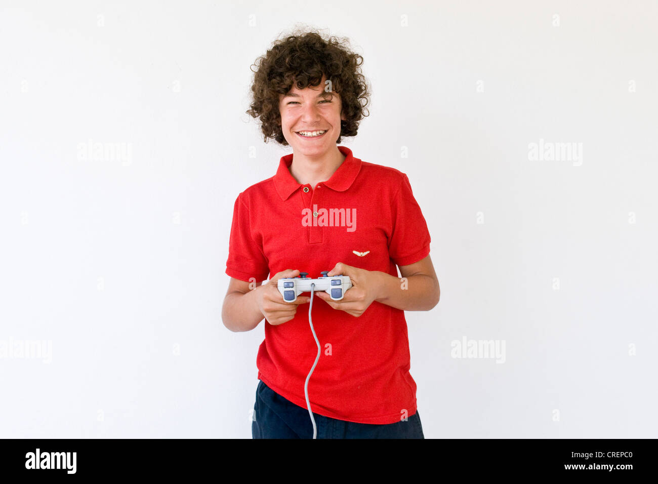 Boy playing video game Stock Photo - Alamy