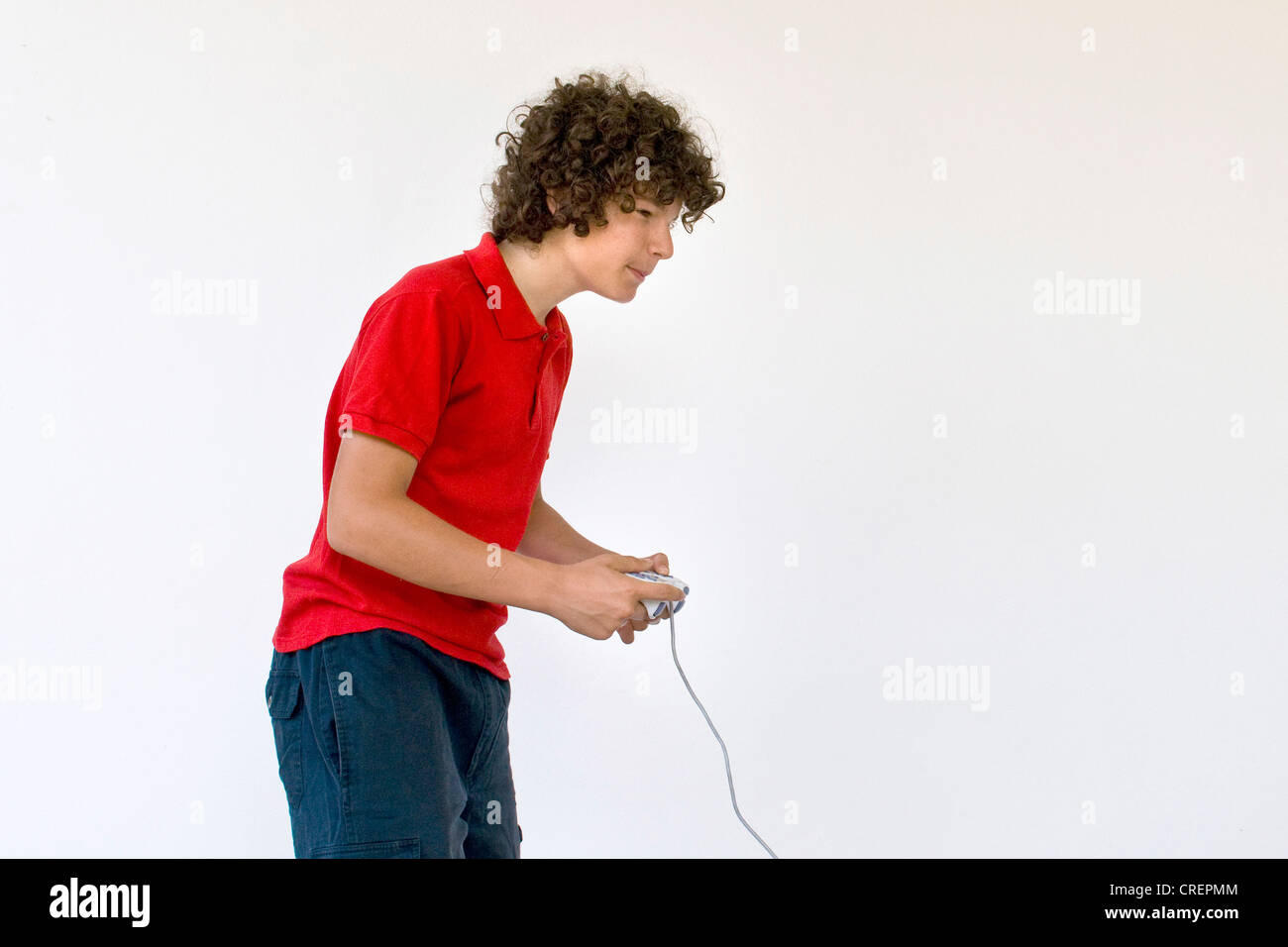 Boy playing video game Stock Photo - Alamy