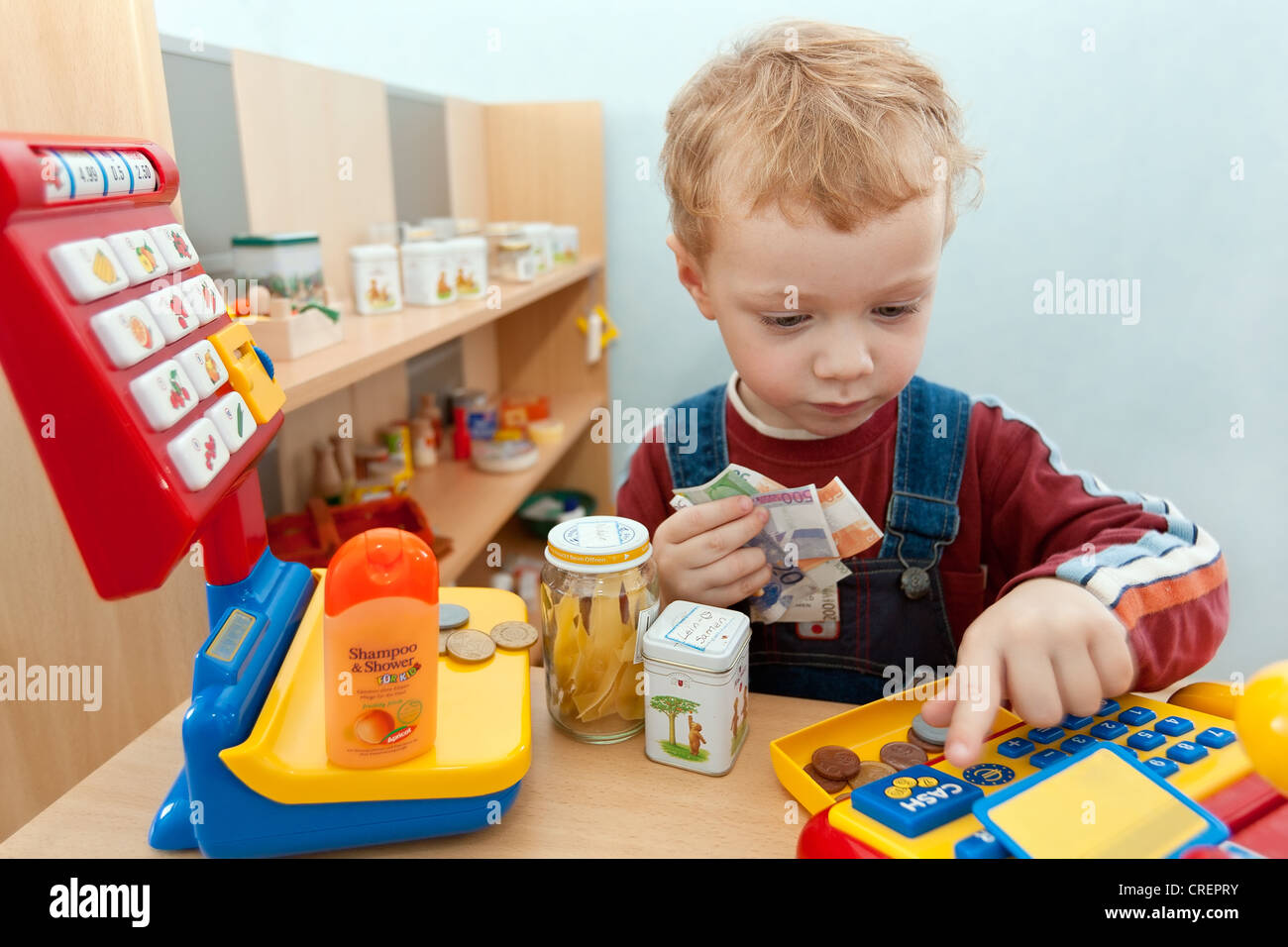 Boy pay toy store hi-res stock photography and images - Alamy