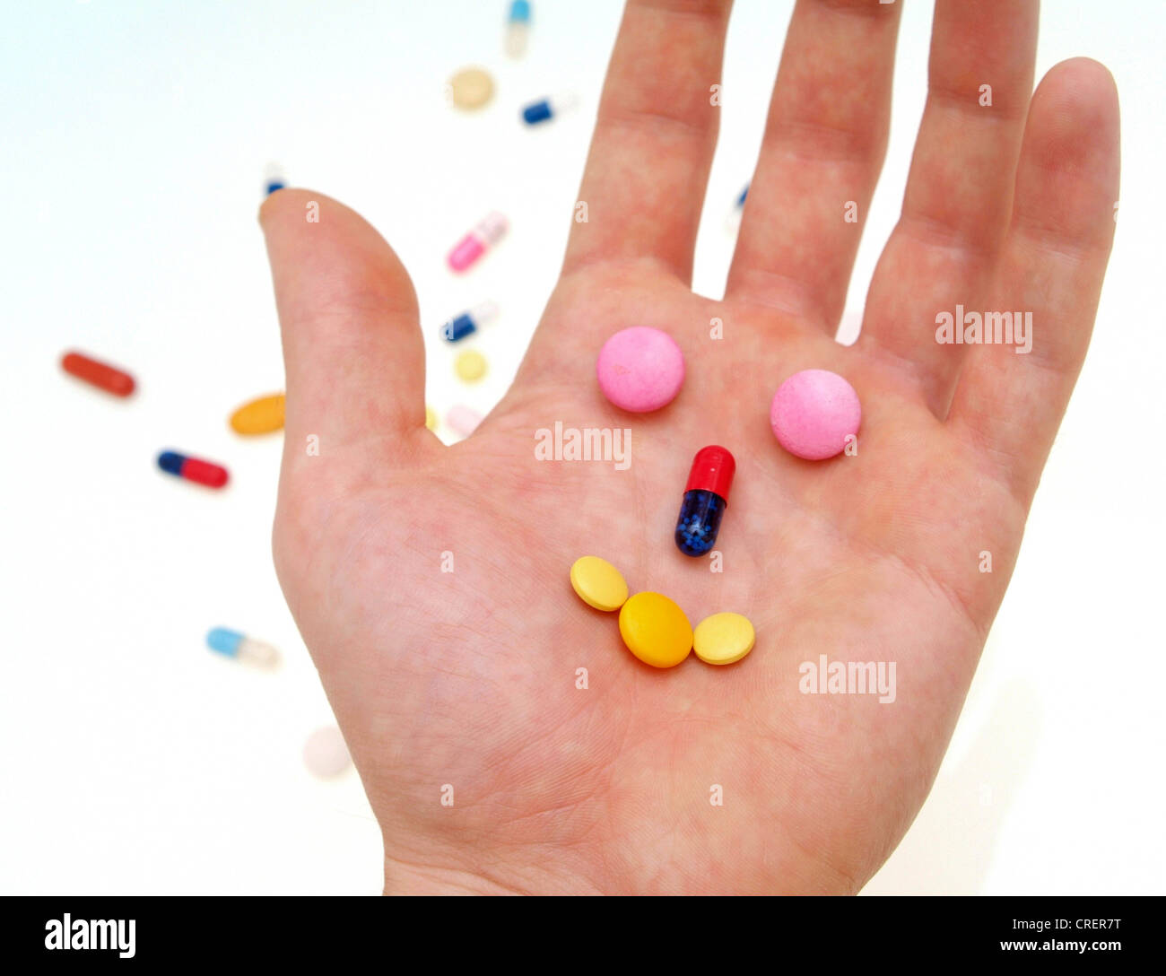 friendly face of tablets in hand Stock Photo - Alamy