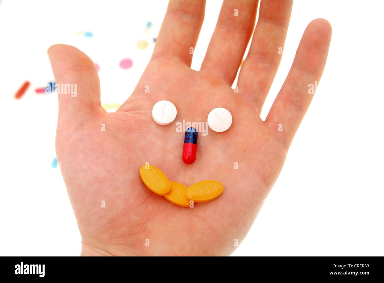 friendly face of tablets in hand Stock Photo - Alamy