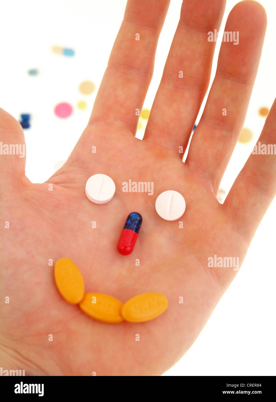 friendly face of tablets in hand Stock Photo - Alamy