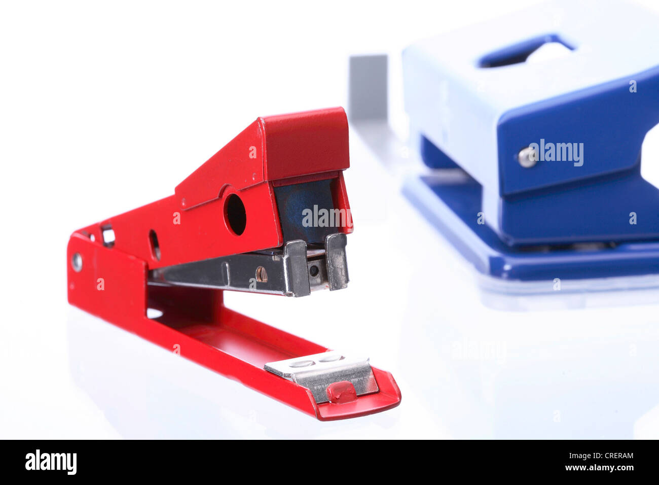 staple gun and hole puncher Stock Photo - Alamy